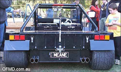 Oil stain garage: Mini Moke on insanely wide tires